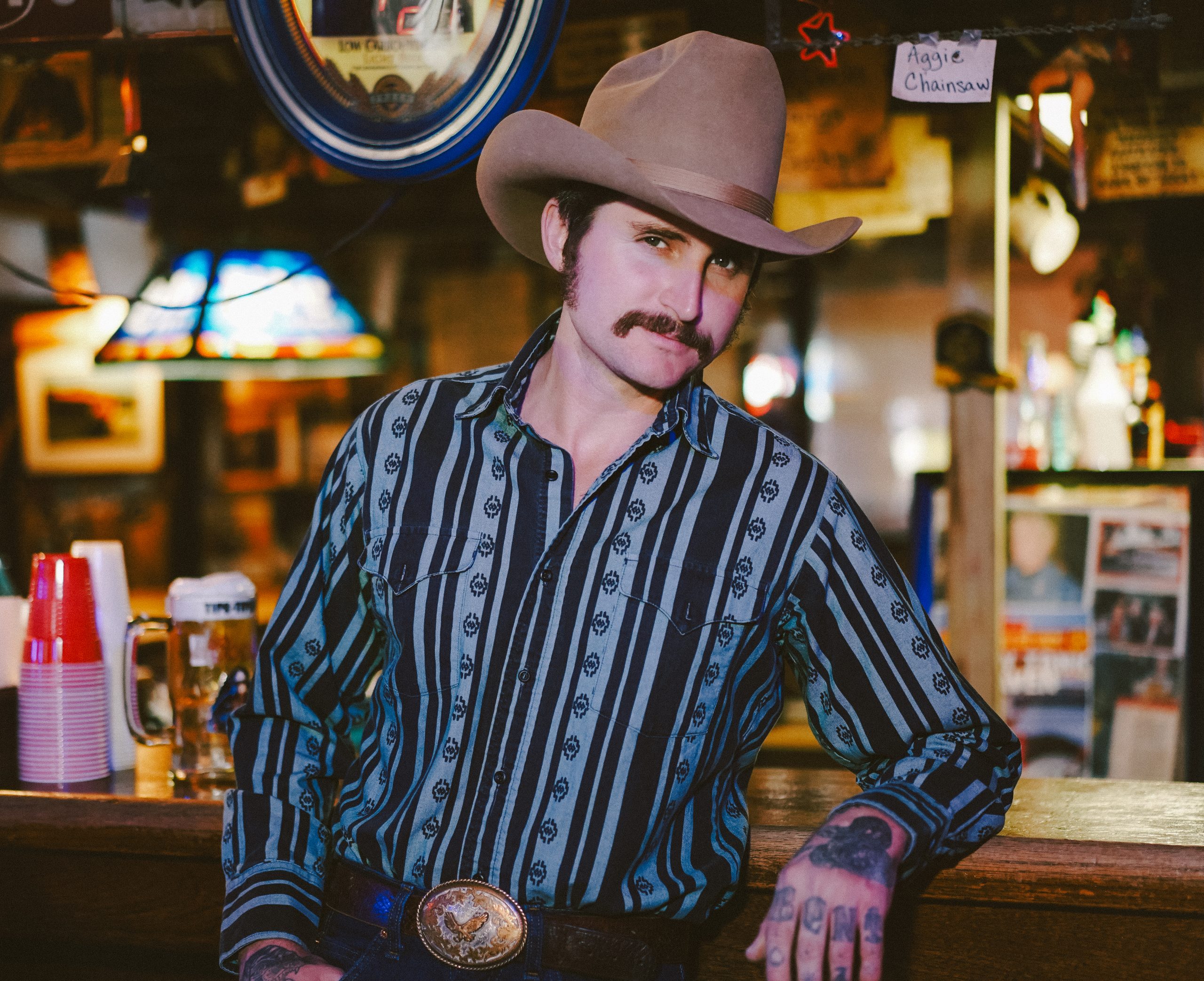 On the road and at home, at the same time: Jesse Daniel plays Santa ...